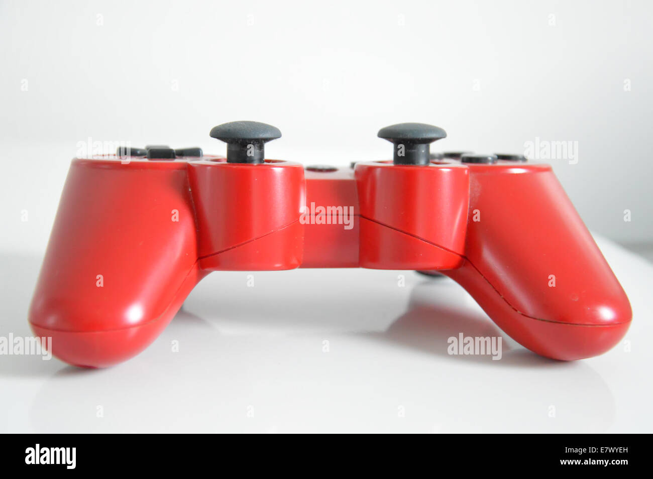 Red game controller Stock Photo - Alamy