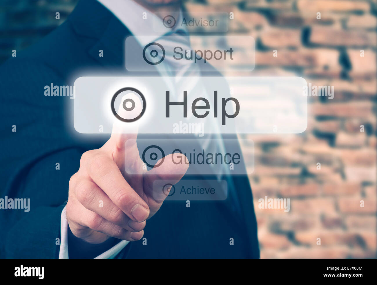 Businessman pressing a Self Help concept button Stock Photo - Alamy