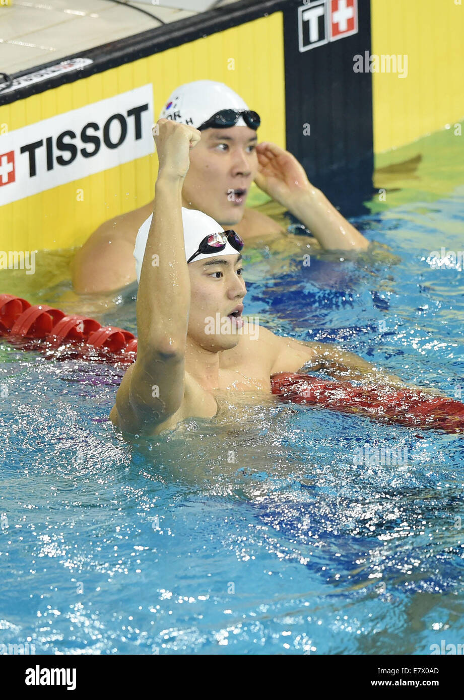 Incheon, South Korea. 25th Sep, 2014. Ning Zetao (front) of China and ...