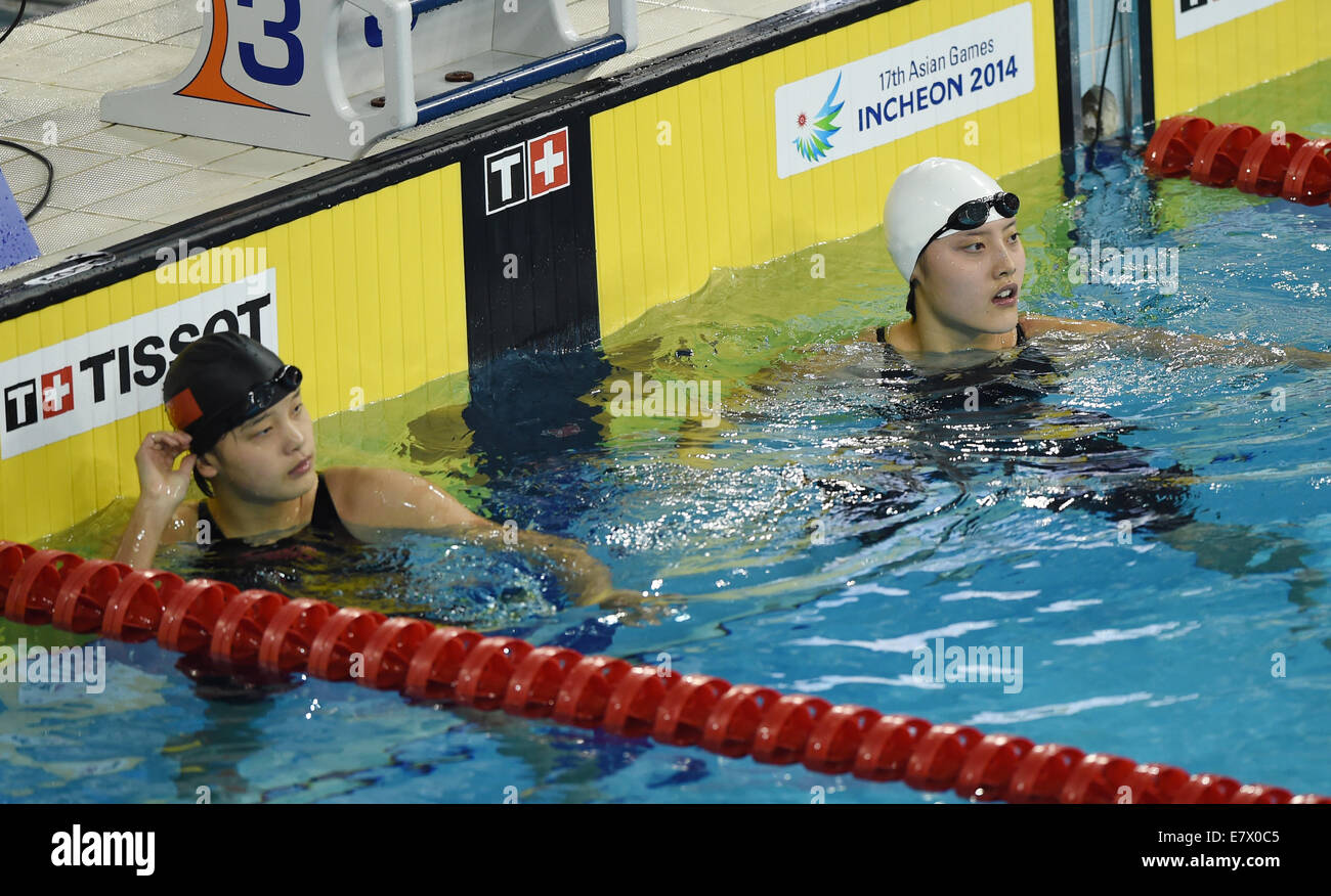 Incheon, South Korea. 25th Sep, 2014. Suo Ran (R) and He Yuzhe of China ...
