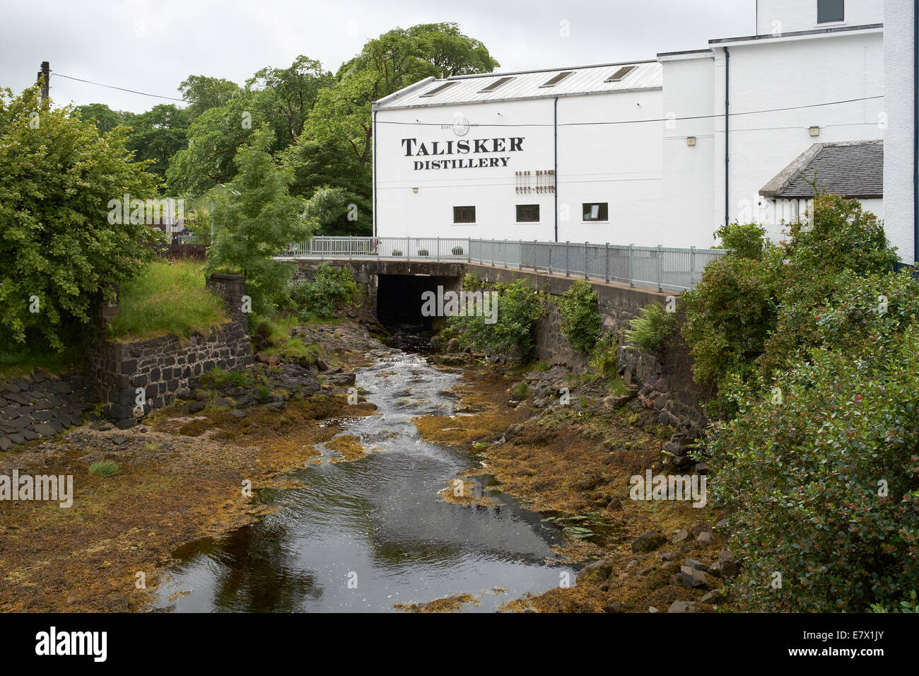Talisker Distillery on the shore of Loch Harport on the Isle of Skye ...