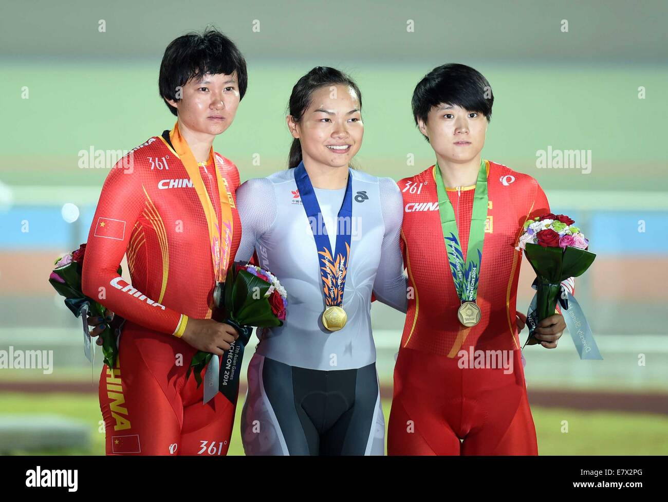 Incheon, South Korea. 25th Sep, 2014. Gold medalist Lee Wai Sze (C) of ...