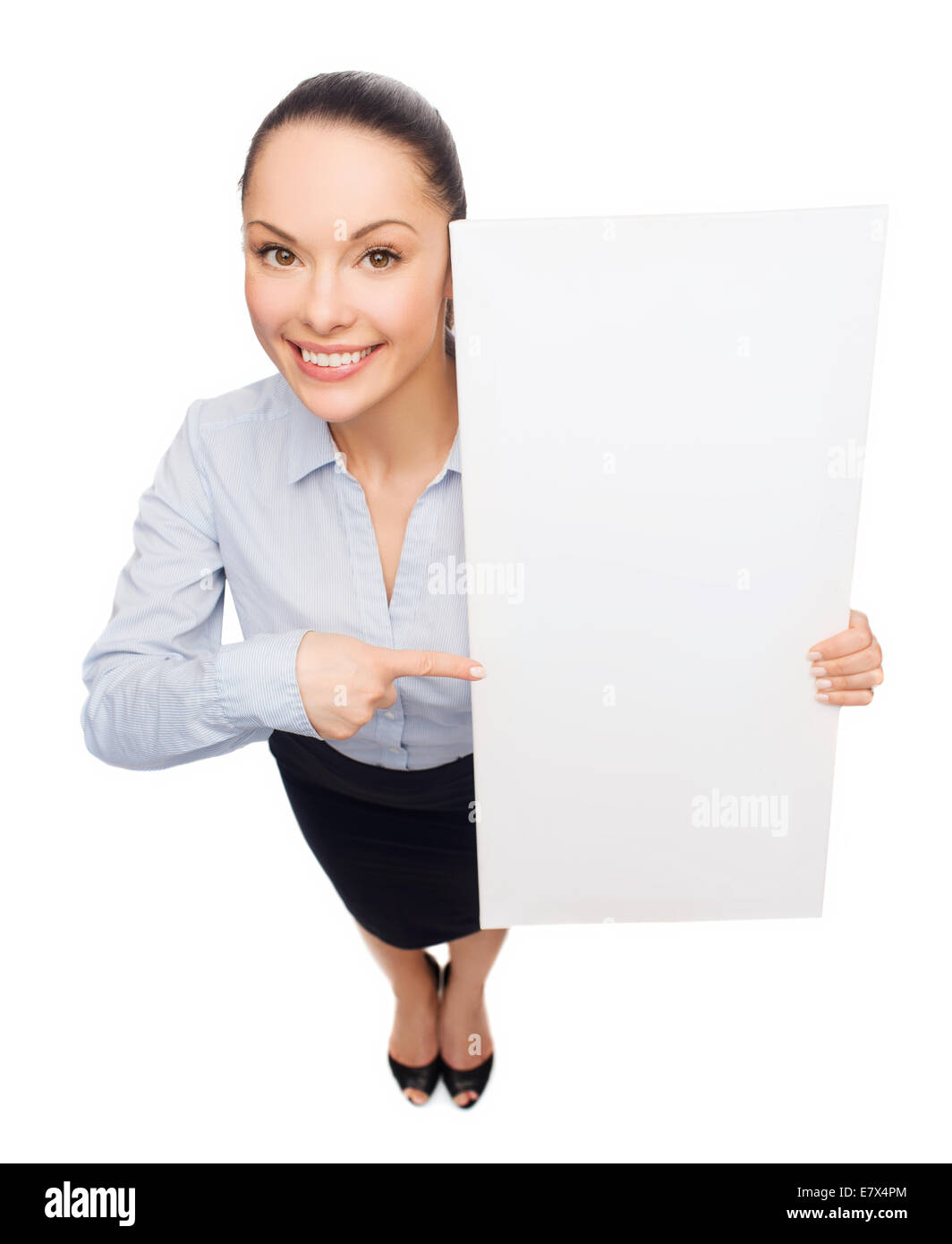 businesswoman pointing to white blank board Stock Photo - Alamy