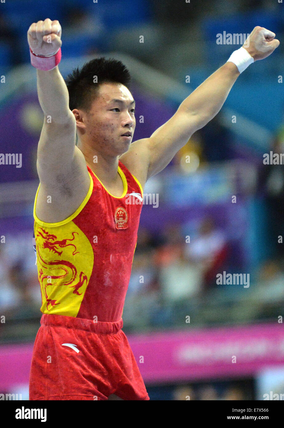 Incheon, South Korea. 25th Sep, 2014. Huang Xi of China performs during ...