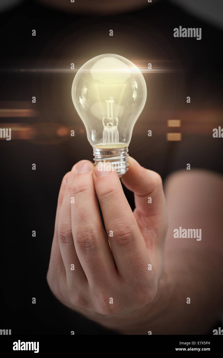 close up of man hand holding light bulb Stock Photo - Alamy