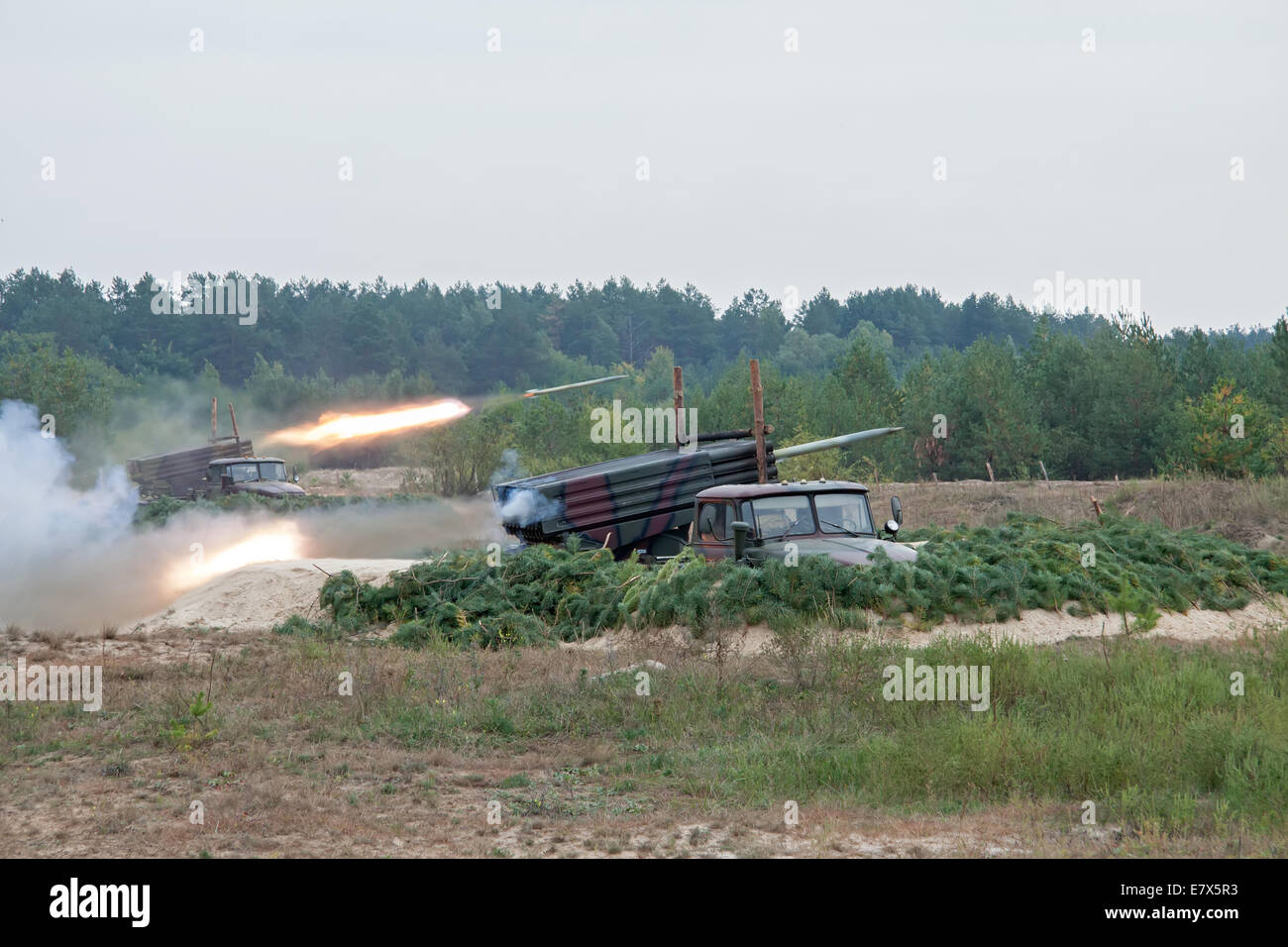 BM-21 rocket launchers in action Stock Photo - Alamy