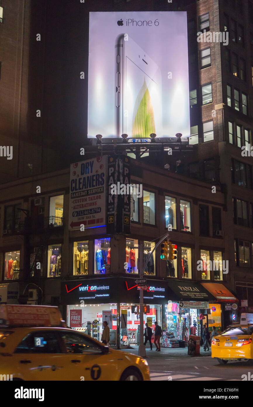 A billboard advertising Apple's iPhone 6 is seen in midtown Manhattan ...