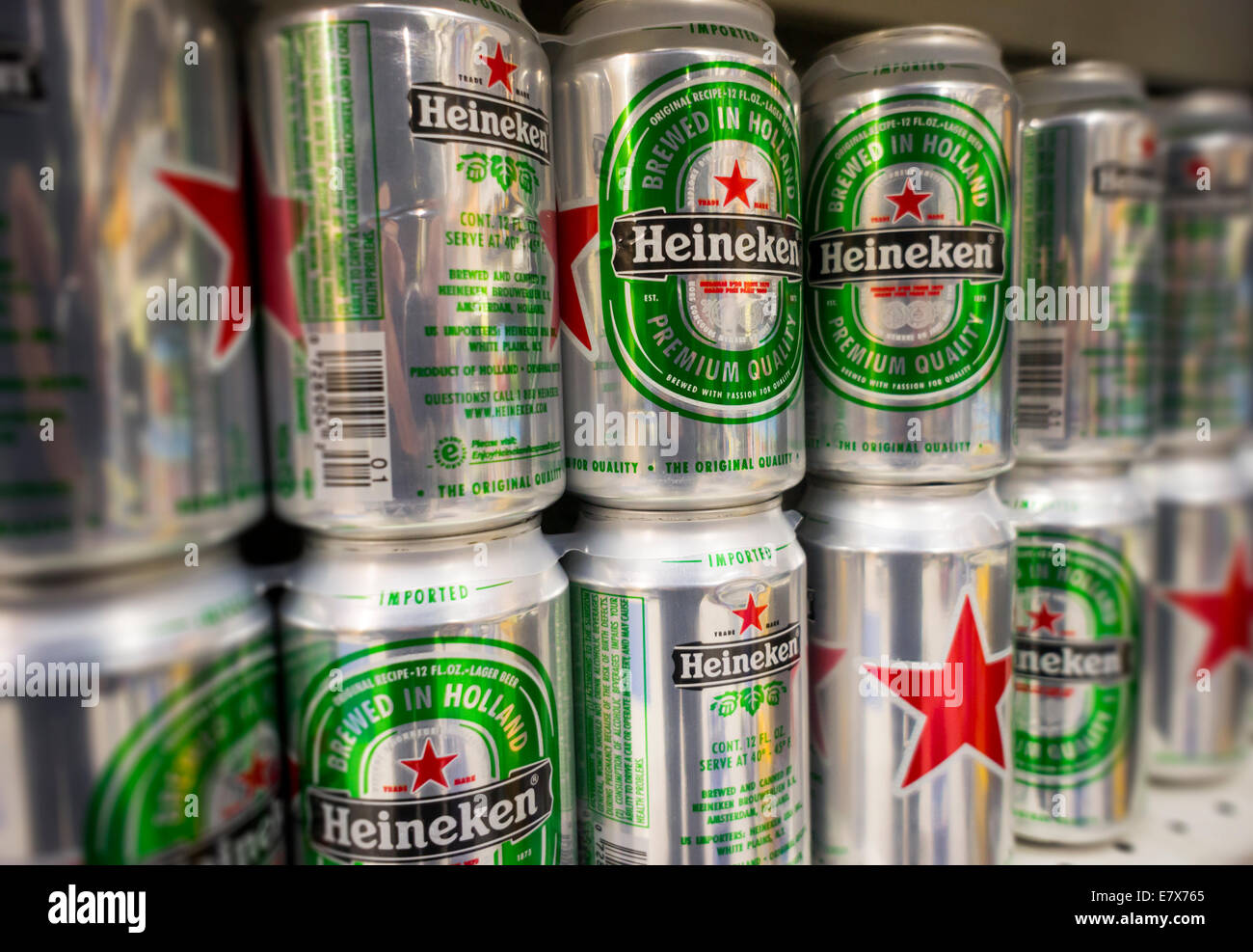 Cans of Heineken beer are seen in a supermarket in New York Stock Photo ...