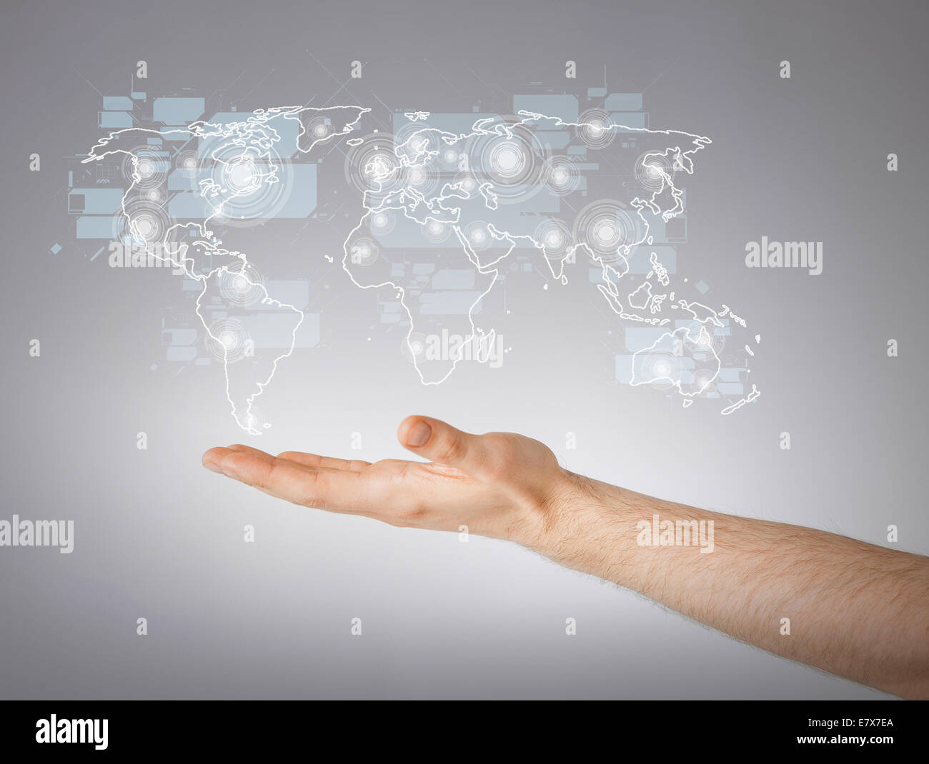 mans hand showing world map Stock Photo - Alamy