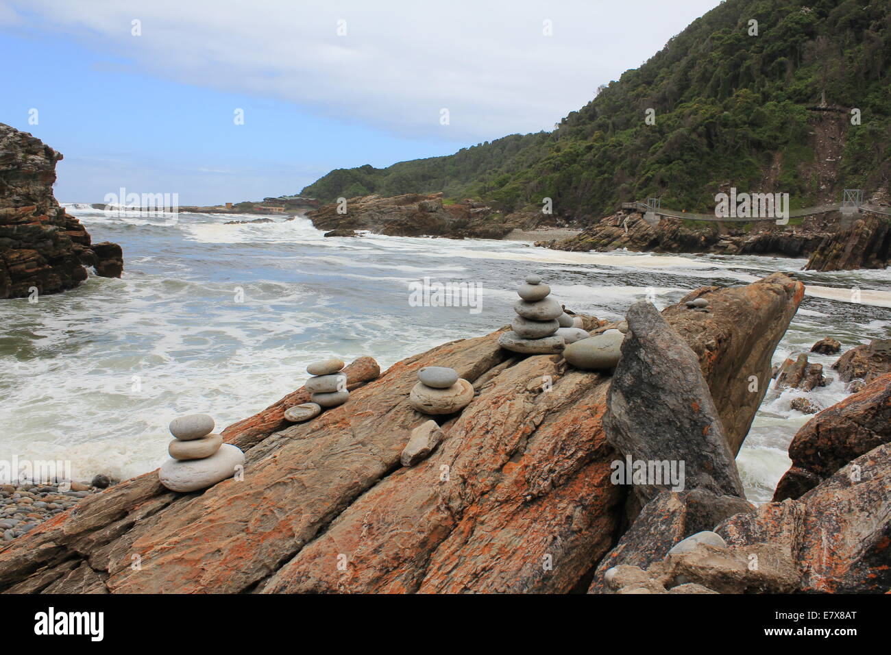 Several Cairn Rock Piles at River Mouth Stock Photo - Alamy