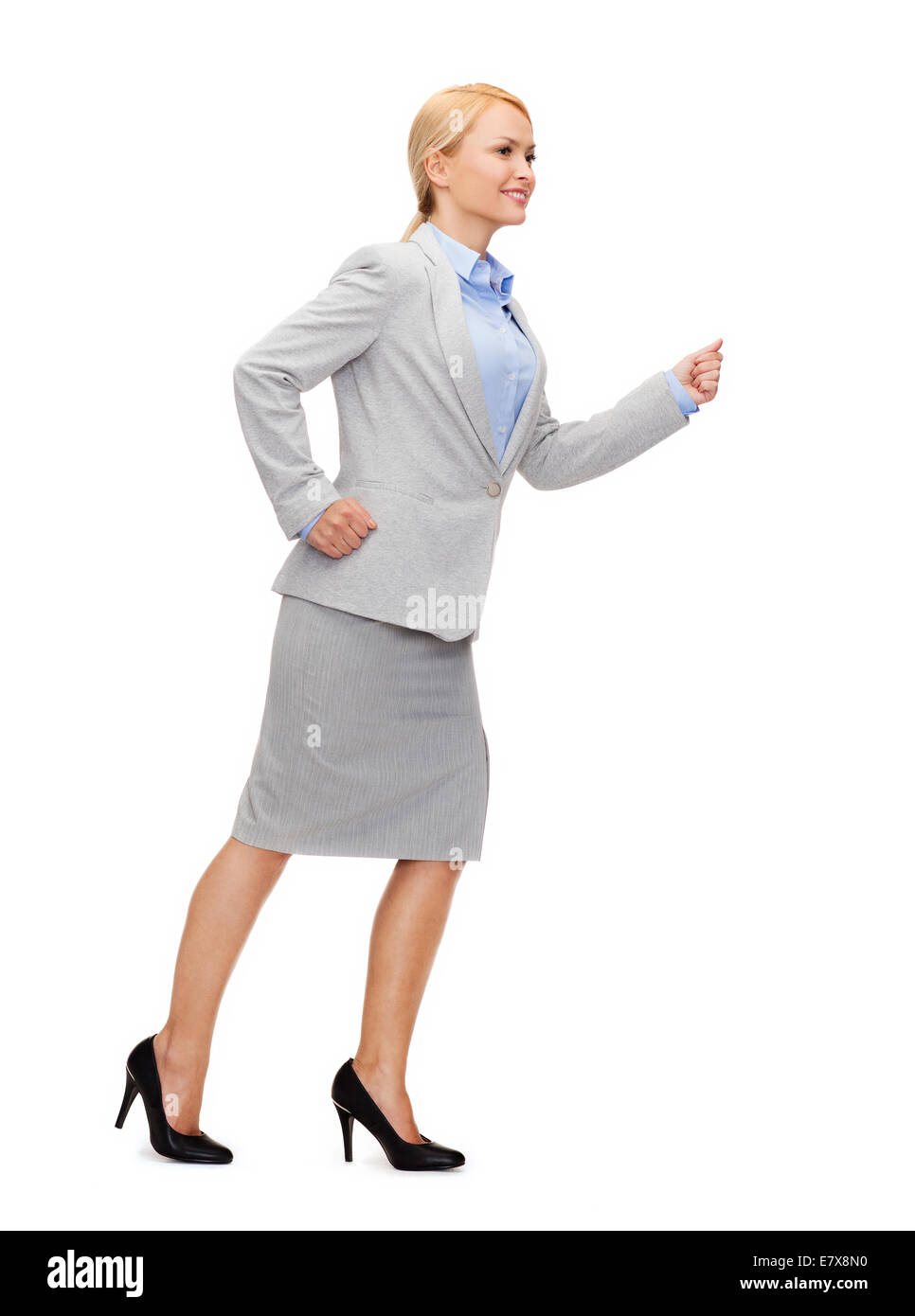 smiling businesswoman running Stock Photo - Alamy