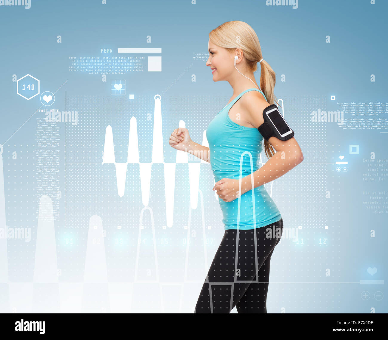 sporty woman running with smartphone and earphones Stock Photo - Alamy