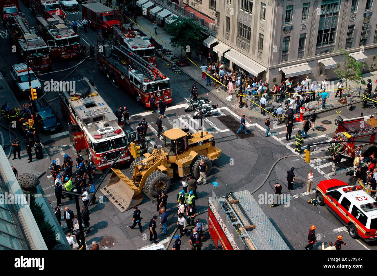 Backhoe and firetrucks at Madison and 62 St building Collapse on July ...