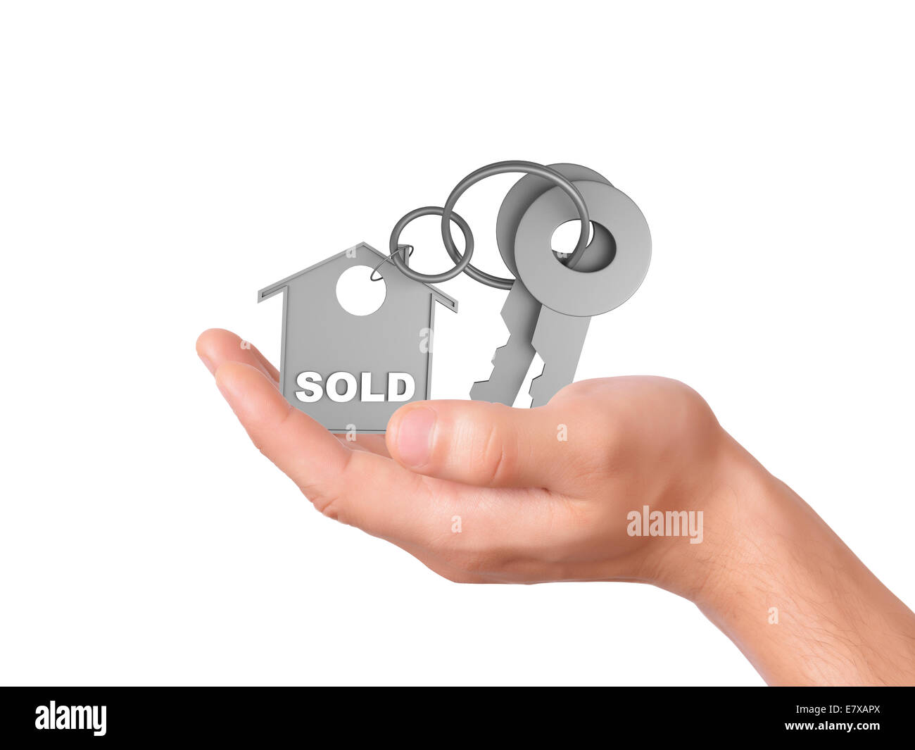 image of hand Holding house keys. sold concept on white background ...