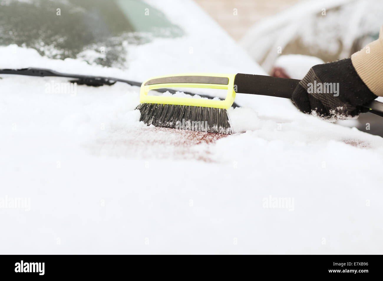 Person wiping snow from car hi-res stock photography and images - Alamy