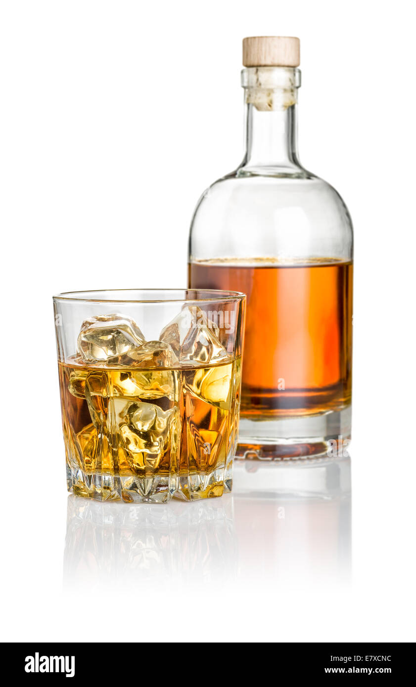 Whisky on the rocks with a bottle Stock Photo - Alamy