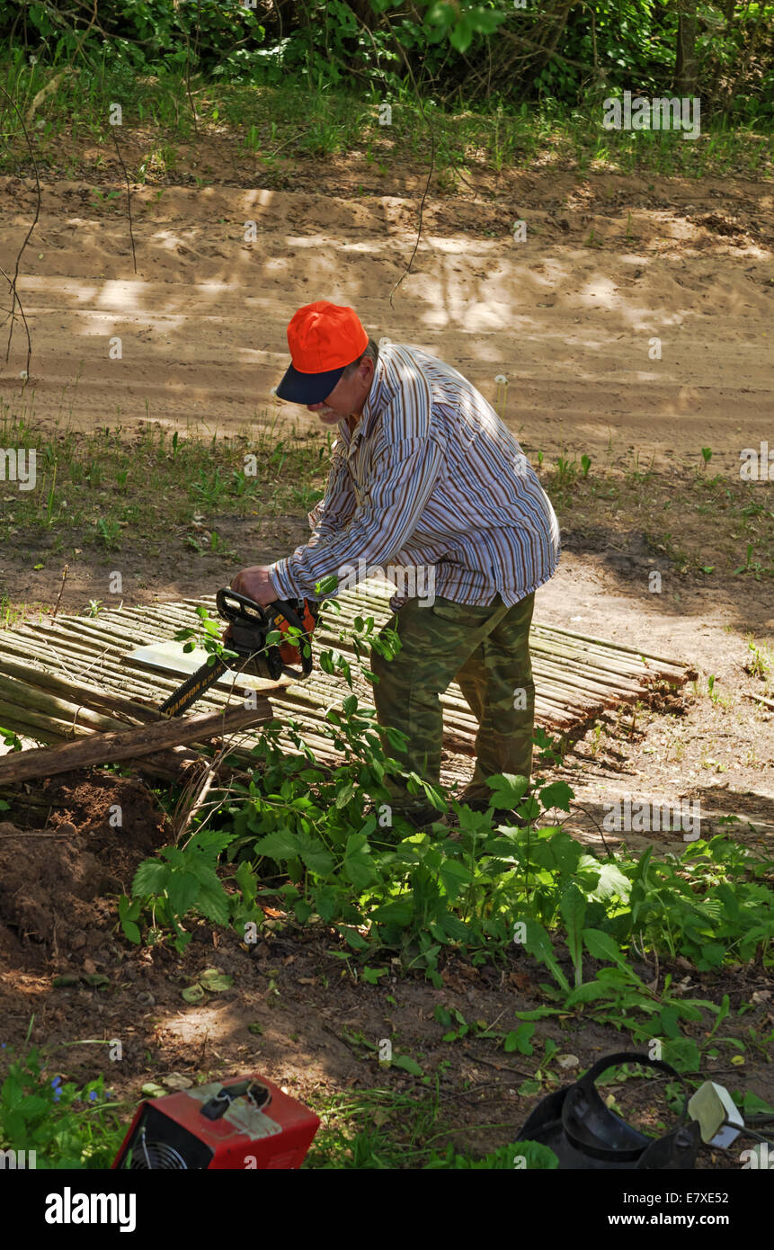 Rural landscape with old barn and wheelbarrow hi-res stock photography ...
