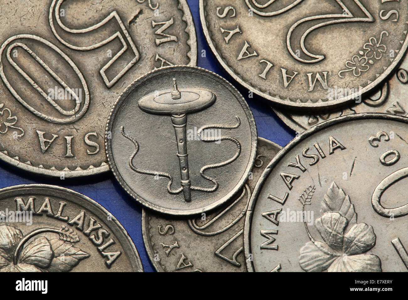 Coins of Malaysia. Malaysian spinning top called the Gasing depicted in ...