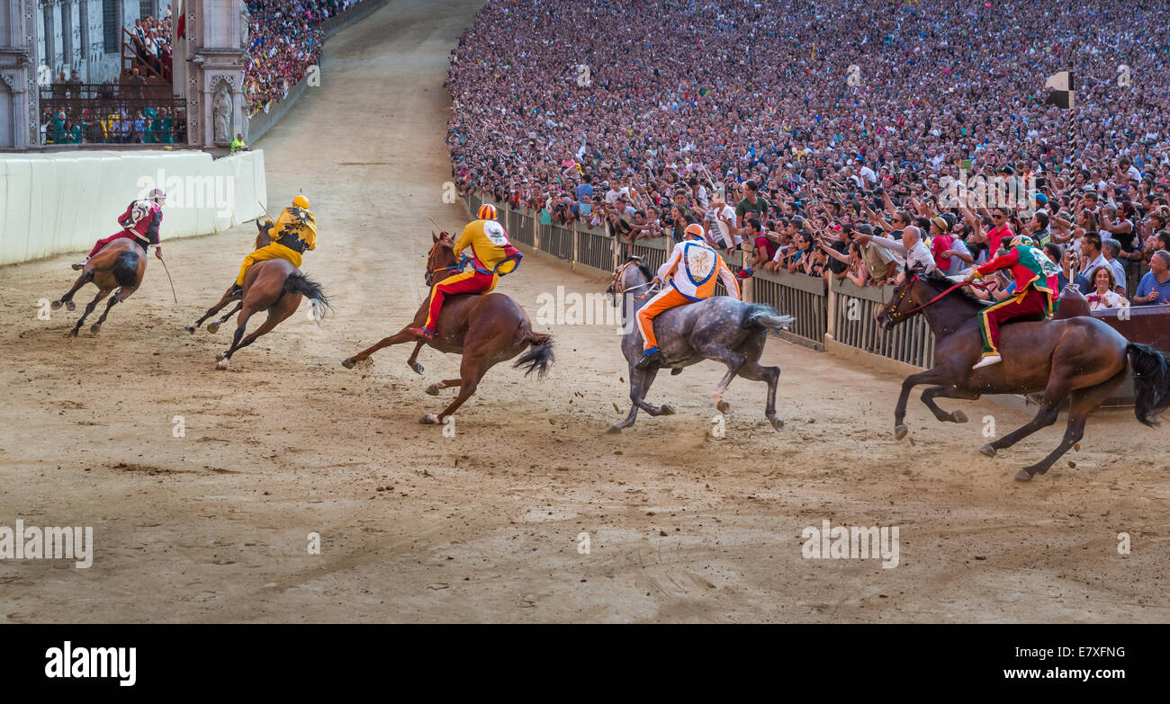 The Palio di Siena horse race on Piazza del Campo, Siena, Tuscany ...