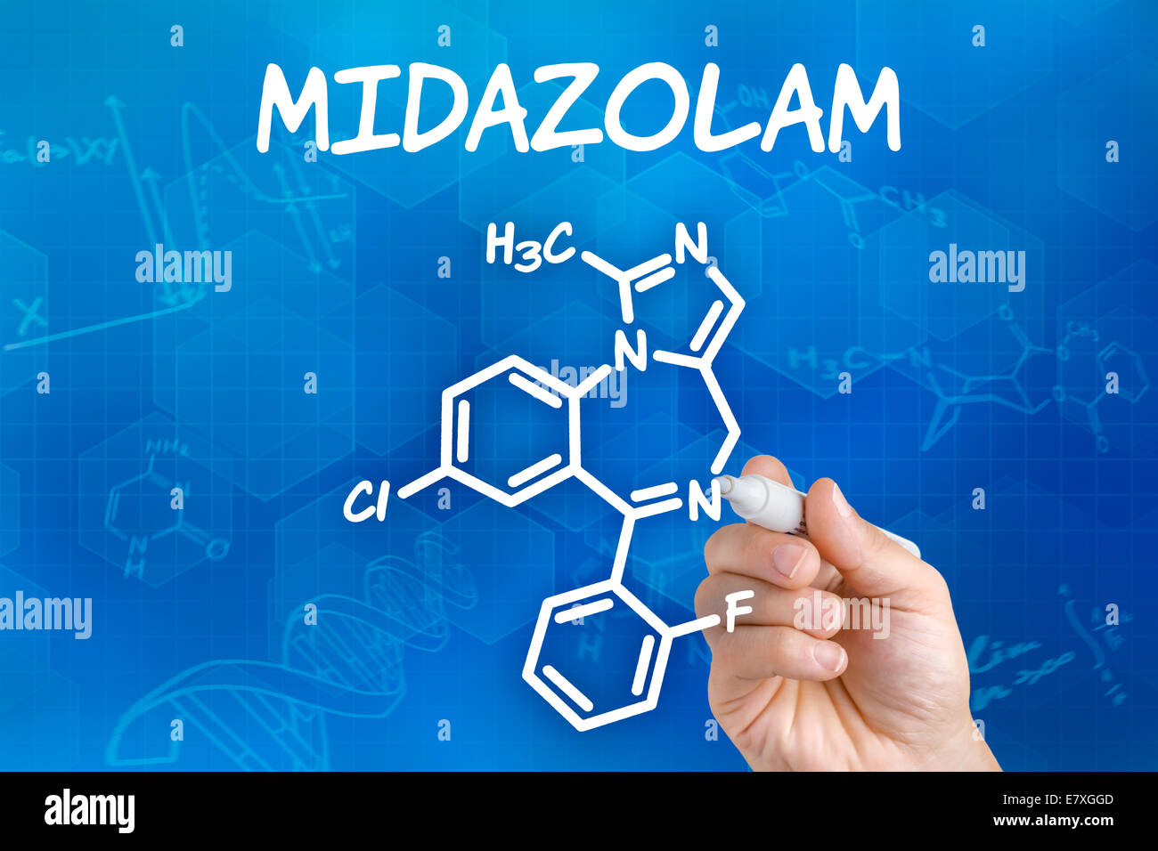 Hand with pen drawing the chemical formula of Midazolam Stock Photo - Alamy