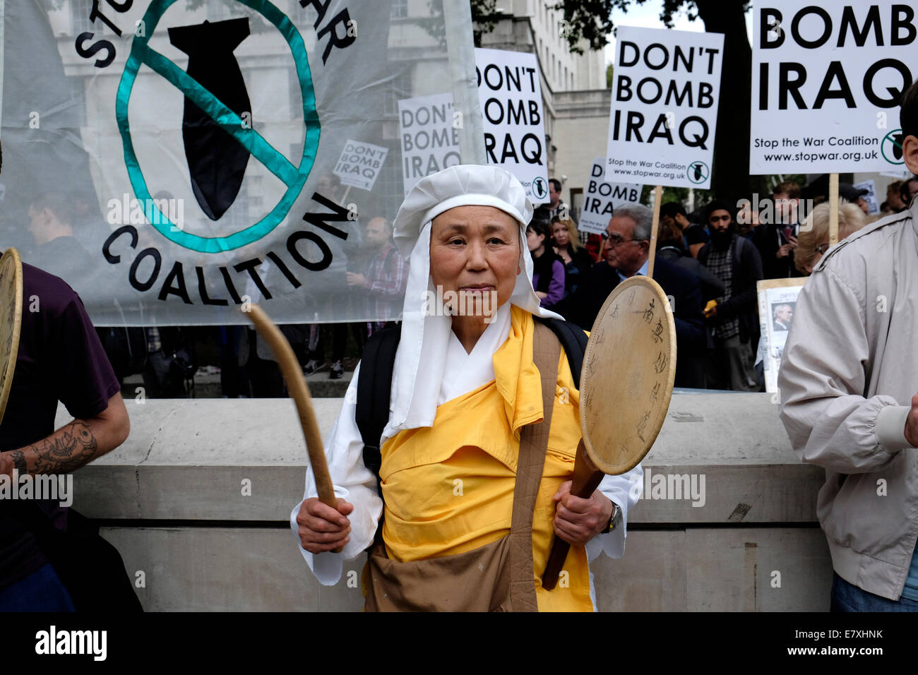 A Buddhist monk protests against the UK involvement in bombing ISIS in ...