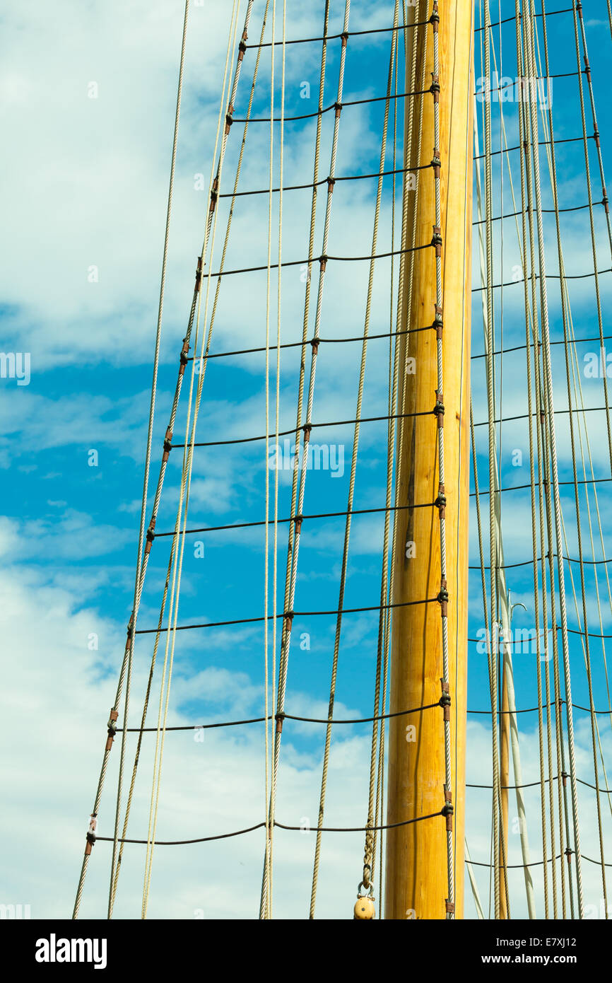 Yachting. Sailboat view of different parts of yacht. Mast against blue ...