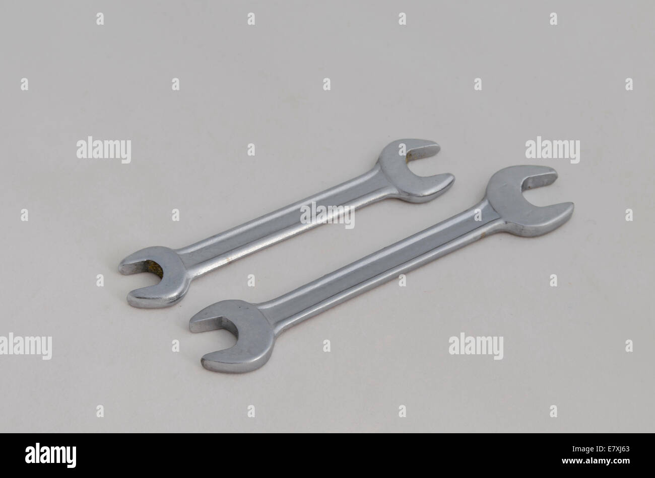 Two used silver spanner on white background Stock Photo - Alamy