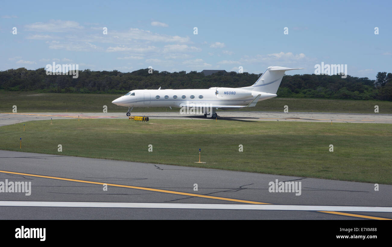 small passenger jet on runway Stock Photo - Alamy
