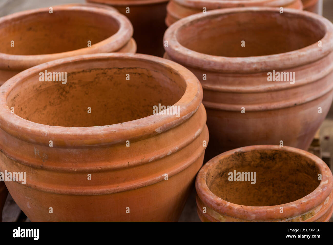 Large empty pots on sale at the local nursery Stock Photo - Alamy