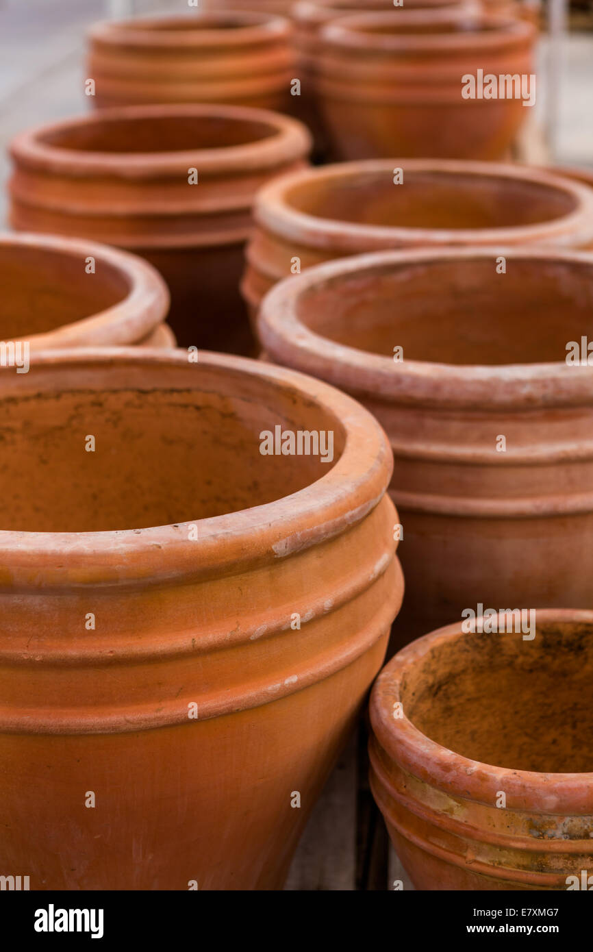 Large empty pots on sale at the local nursery Stock Photo - Alamy