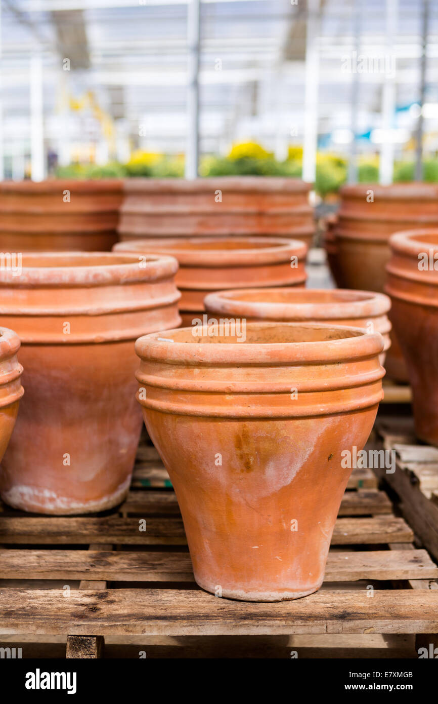 Large empty pots on sale at the local nursery Stock Photo - Alamy