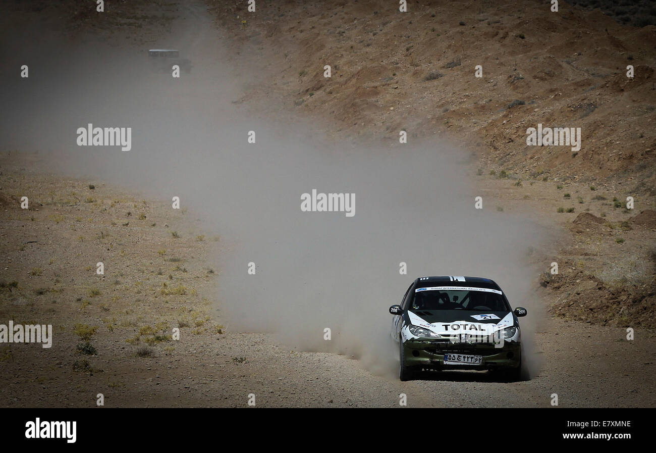 Tehran, Southern Iran. 25th Sep, 2014. Iranian driver Misagh Ghasemi ...