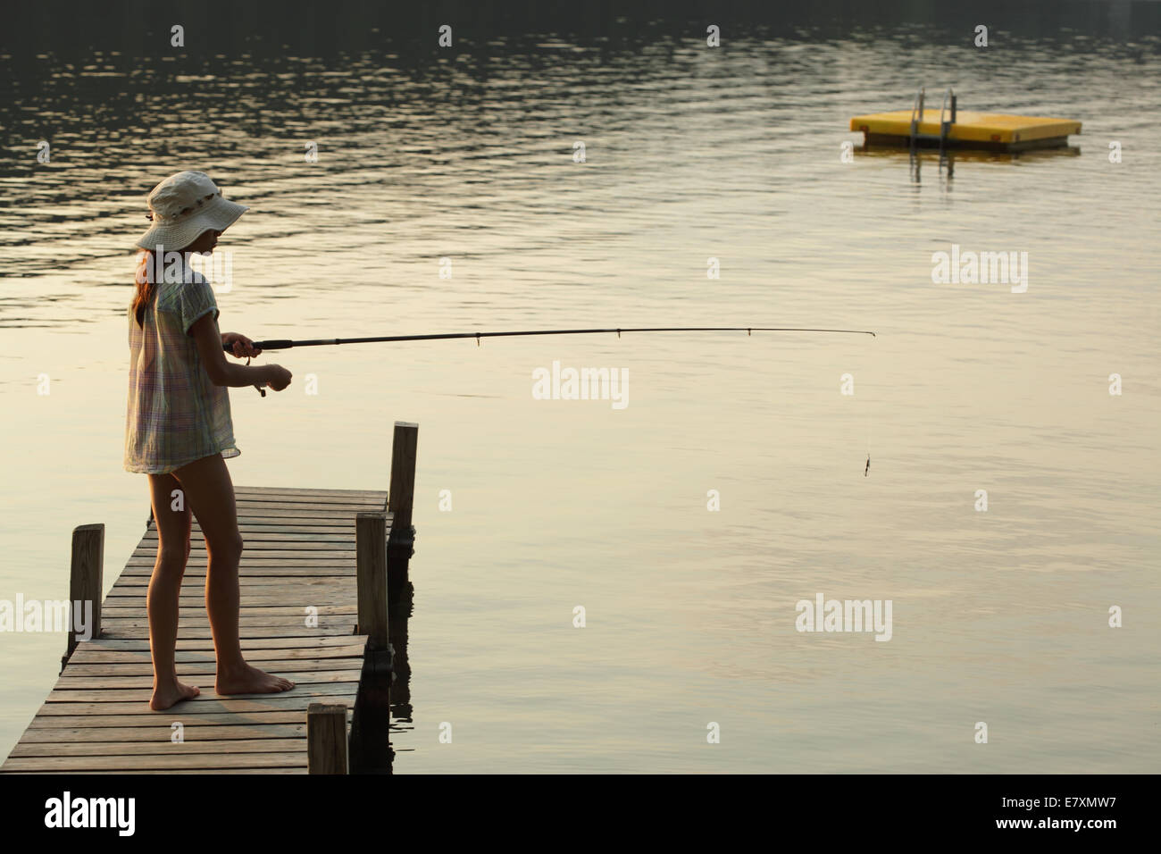 Girl diving into lake hi-res stock photography and images - Alamy