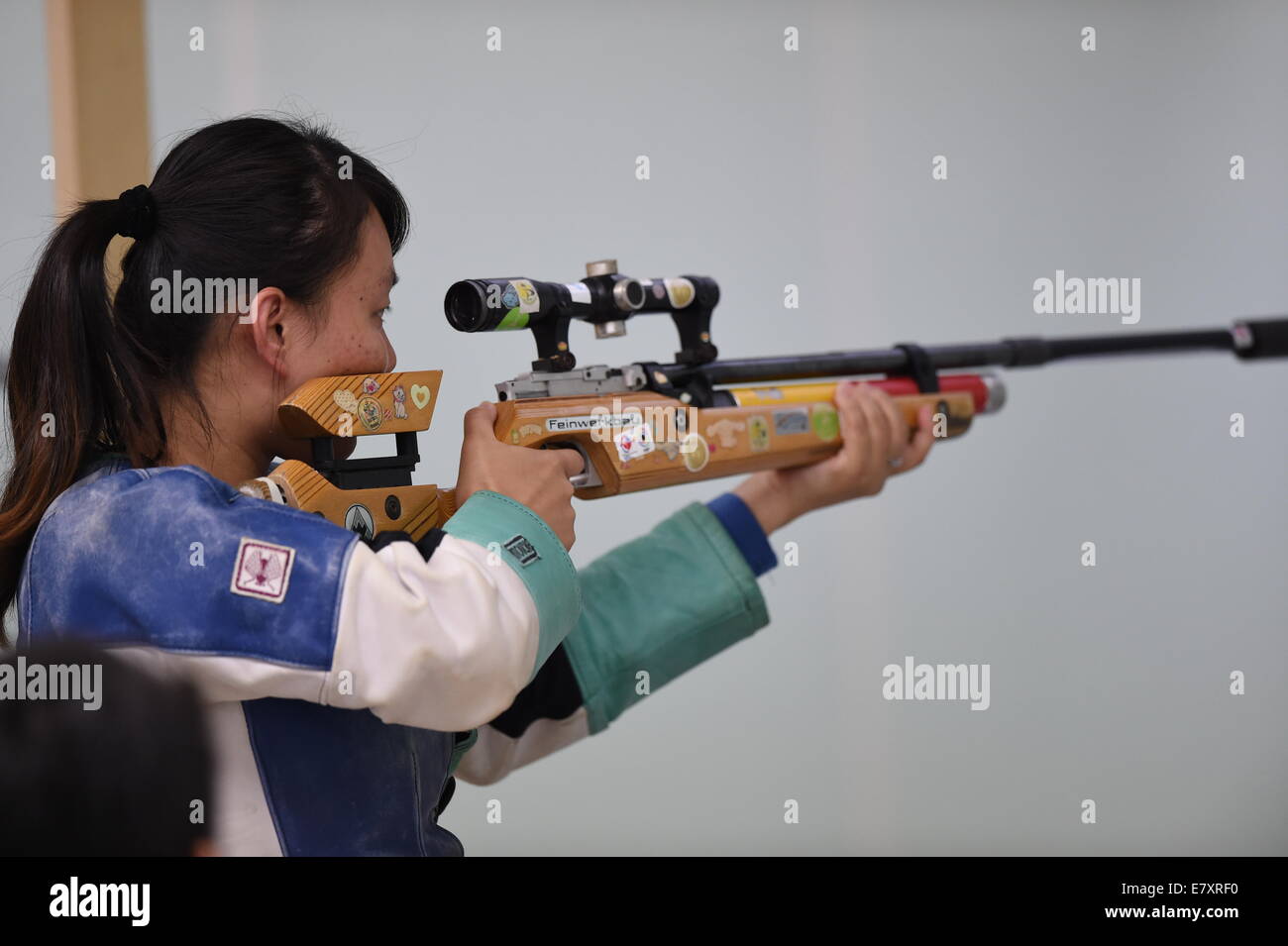 Incheon, South Korea. 26th Sep, 2014. Yang Zeng of China aims during ...