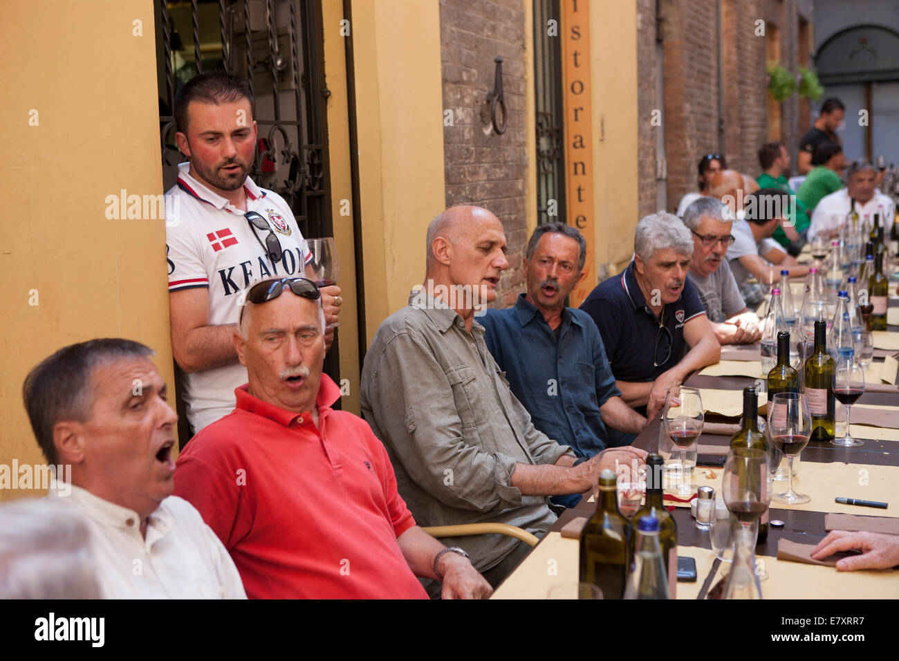 Guests singing at Siena restaurant Tuscany Italy Stock Photo - Alamy