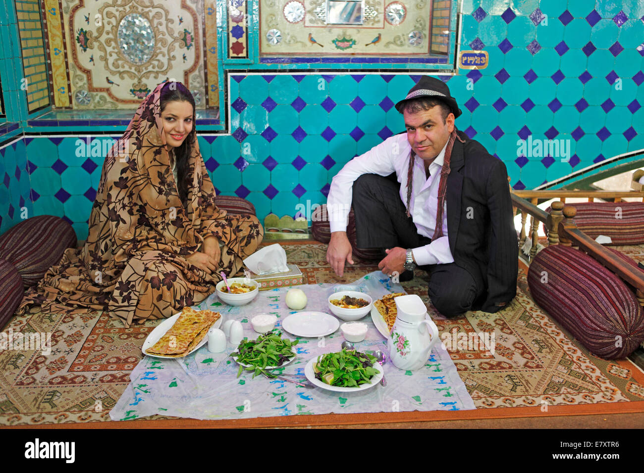 Iranian wedding couple having lunch in a traditional restaurant, Bazaar ...