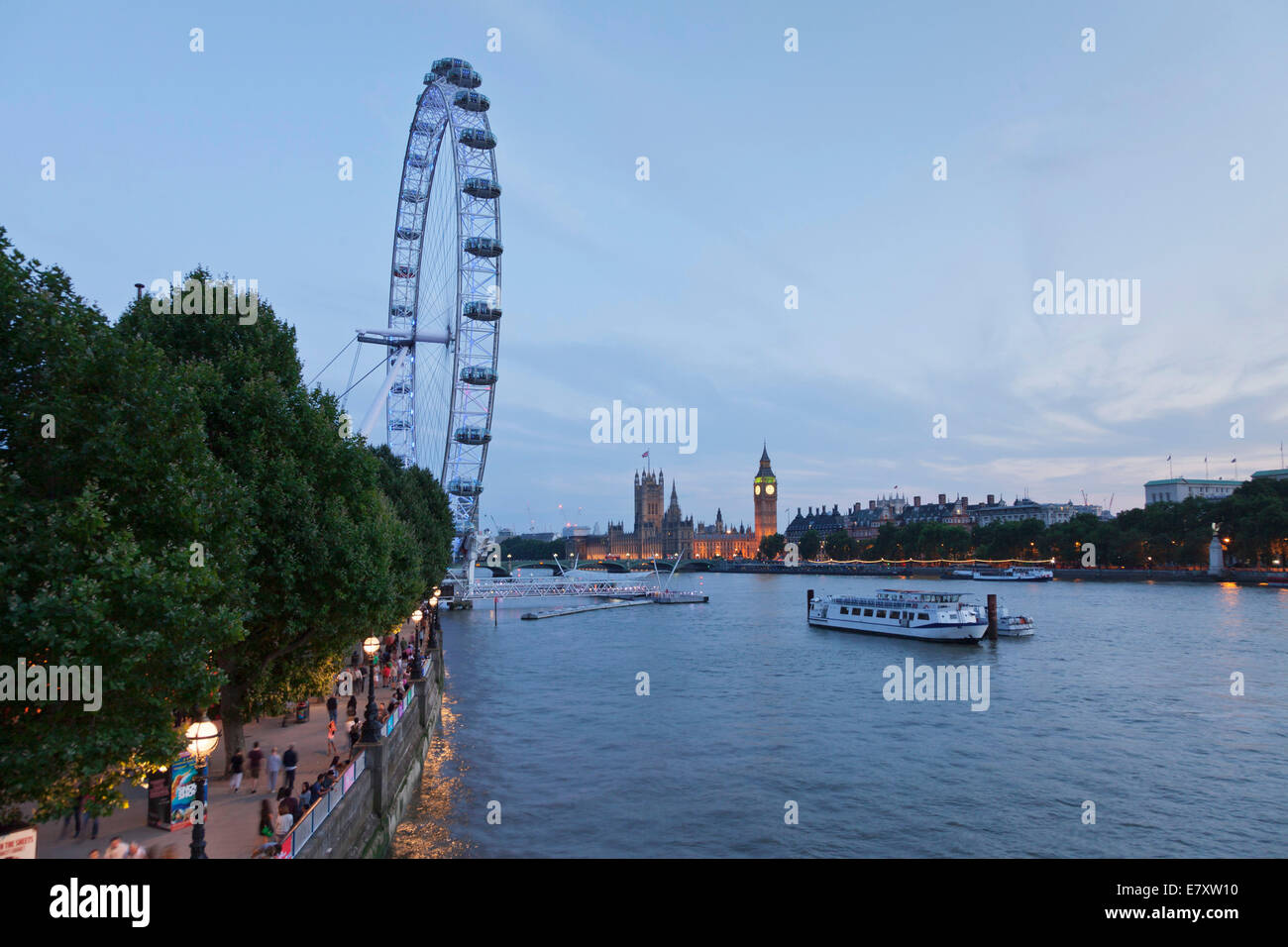 London Eye ferris wheel on the River Thames, South Bank, Houses of ...