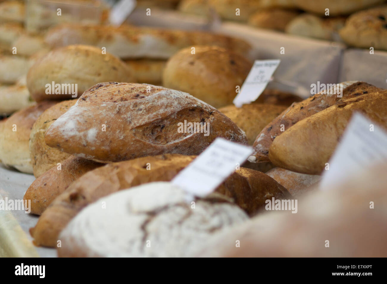 Loaves of bread on a market stall Stock Photo - Alamy