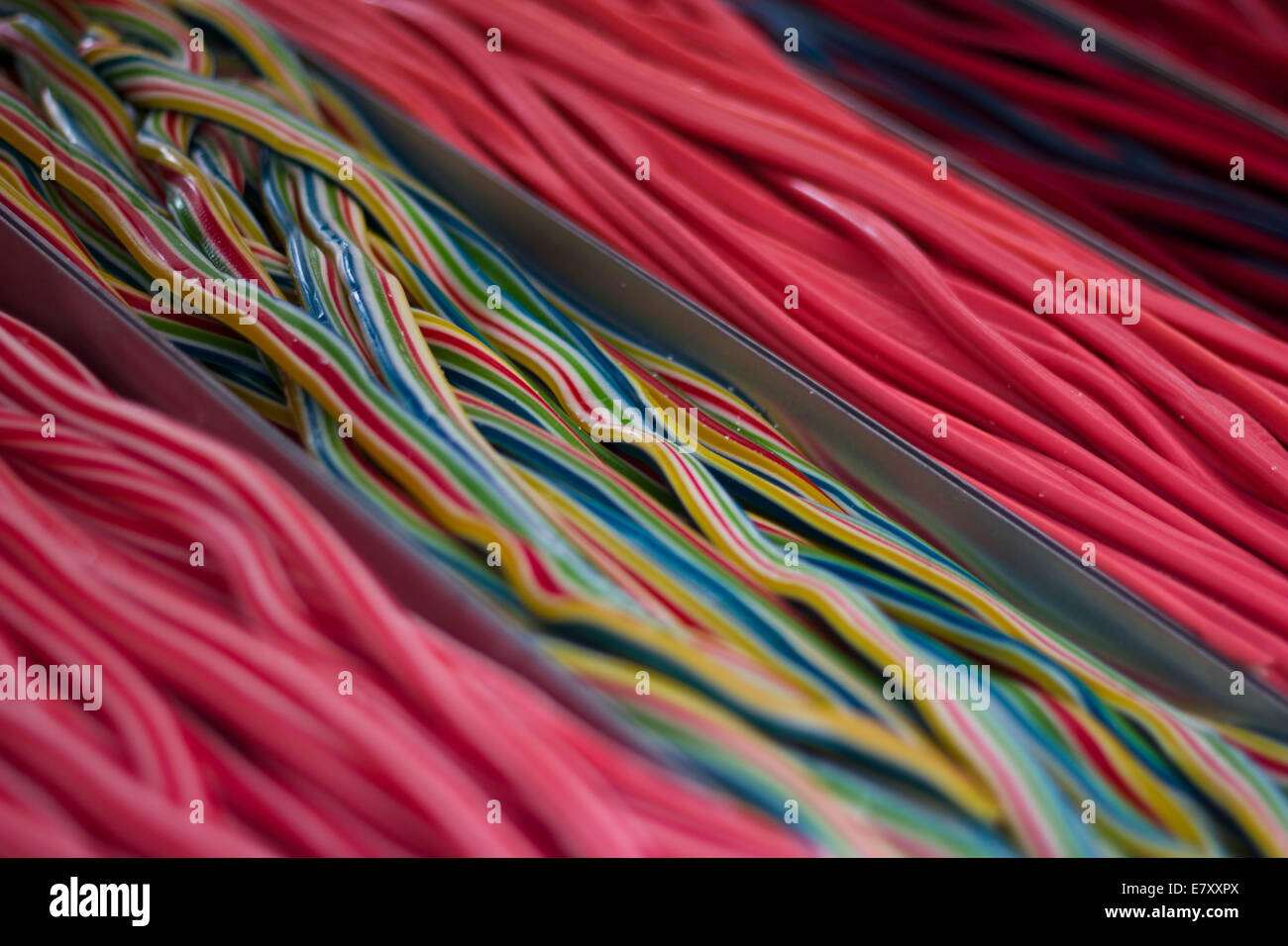 Cable candy on a market stall Stock Photo - Alamy