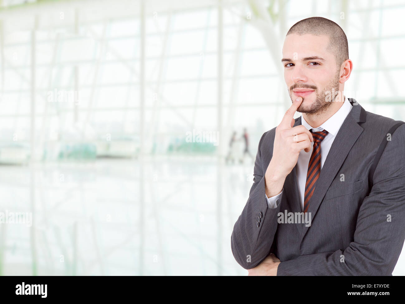 young business man thinking at the office Stock Photo - Alamy