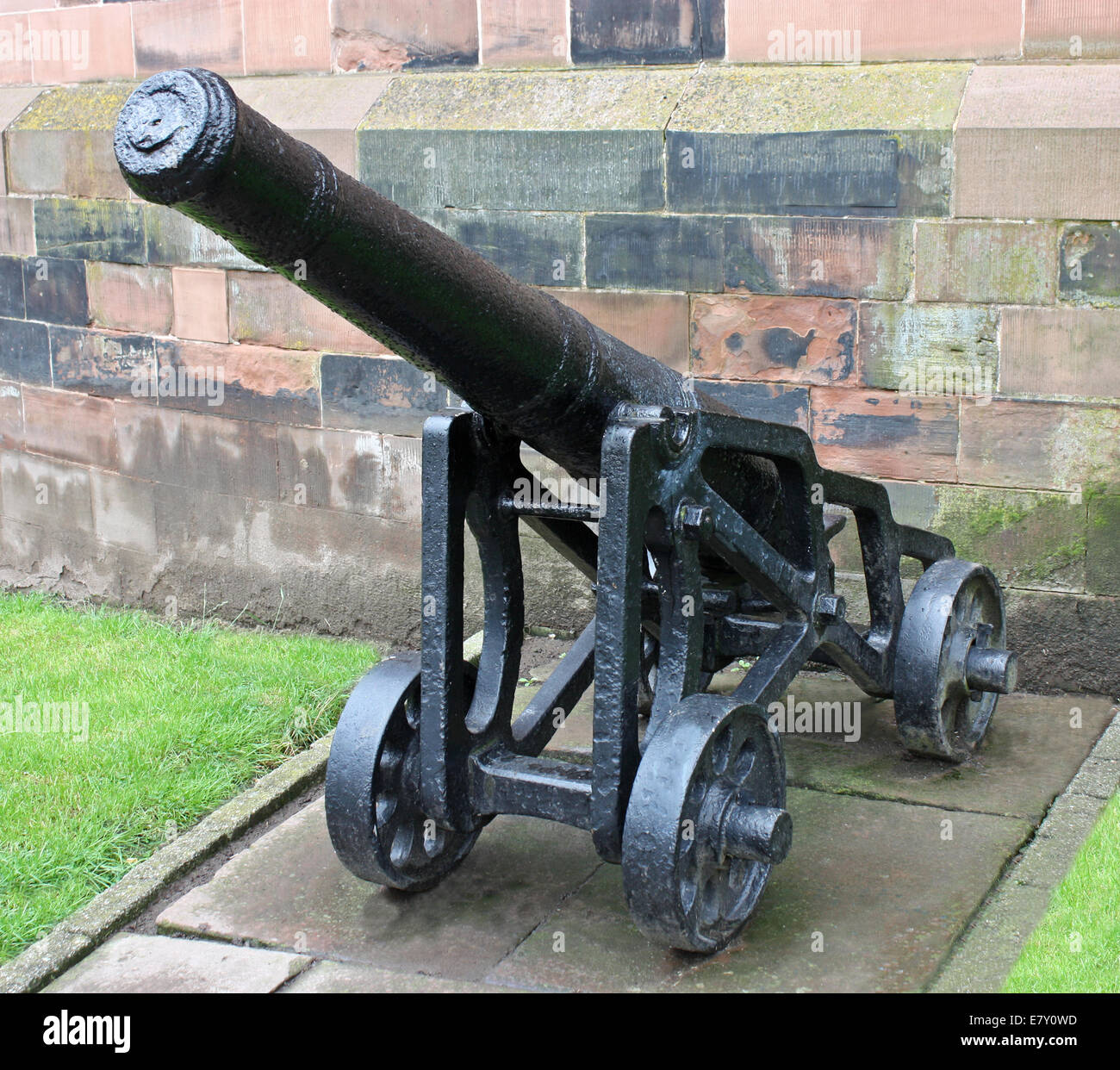 A Vintage Heavy Cannon Outside a Castle Wall Stock Photo - Alamy
