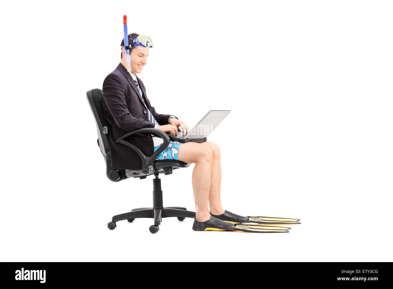 Young guy in office on computer Cut Out Stock Images & Pictures - Alamy