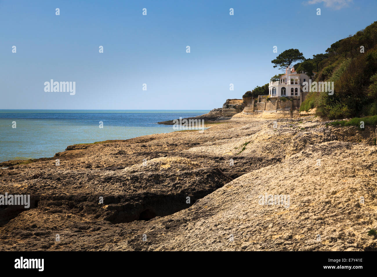 Single imposing house overlooks the calcareous rocks and sea of the ...