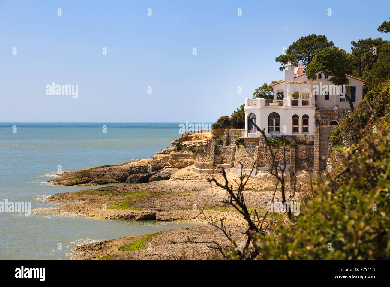 Single imposing house overlooks the calcareous rocks and sea of the ...