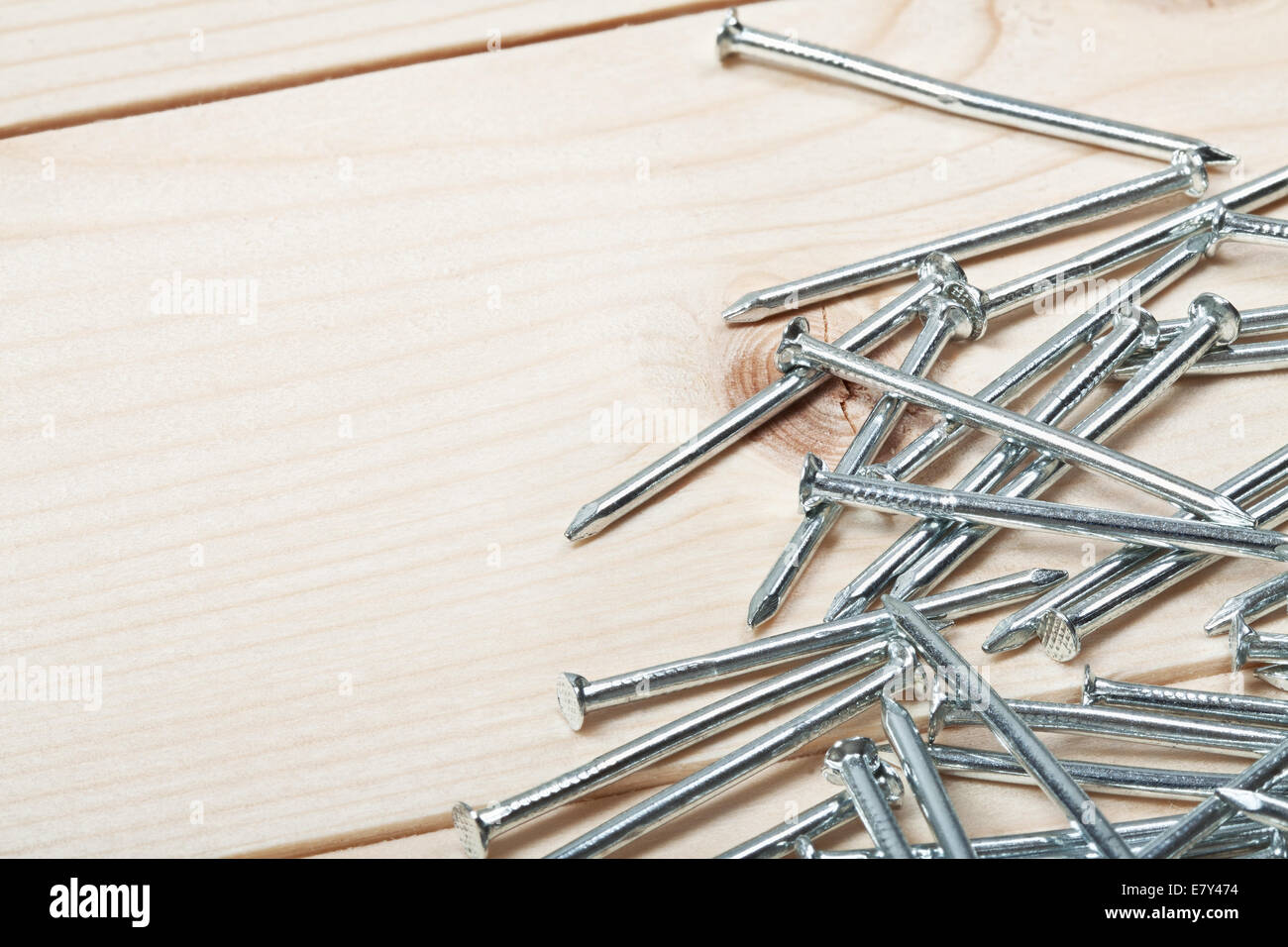 Nails on wooden planks Stock Photo - Alamy