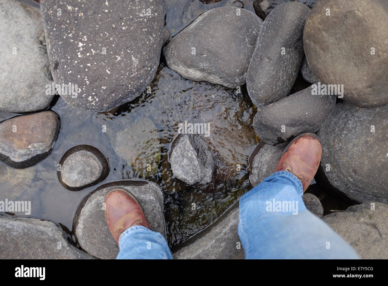 Old hiking boots on a rock hi-res stock photography and images - Alamy