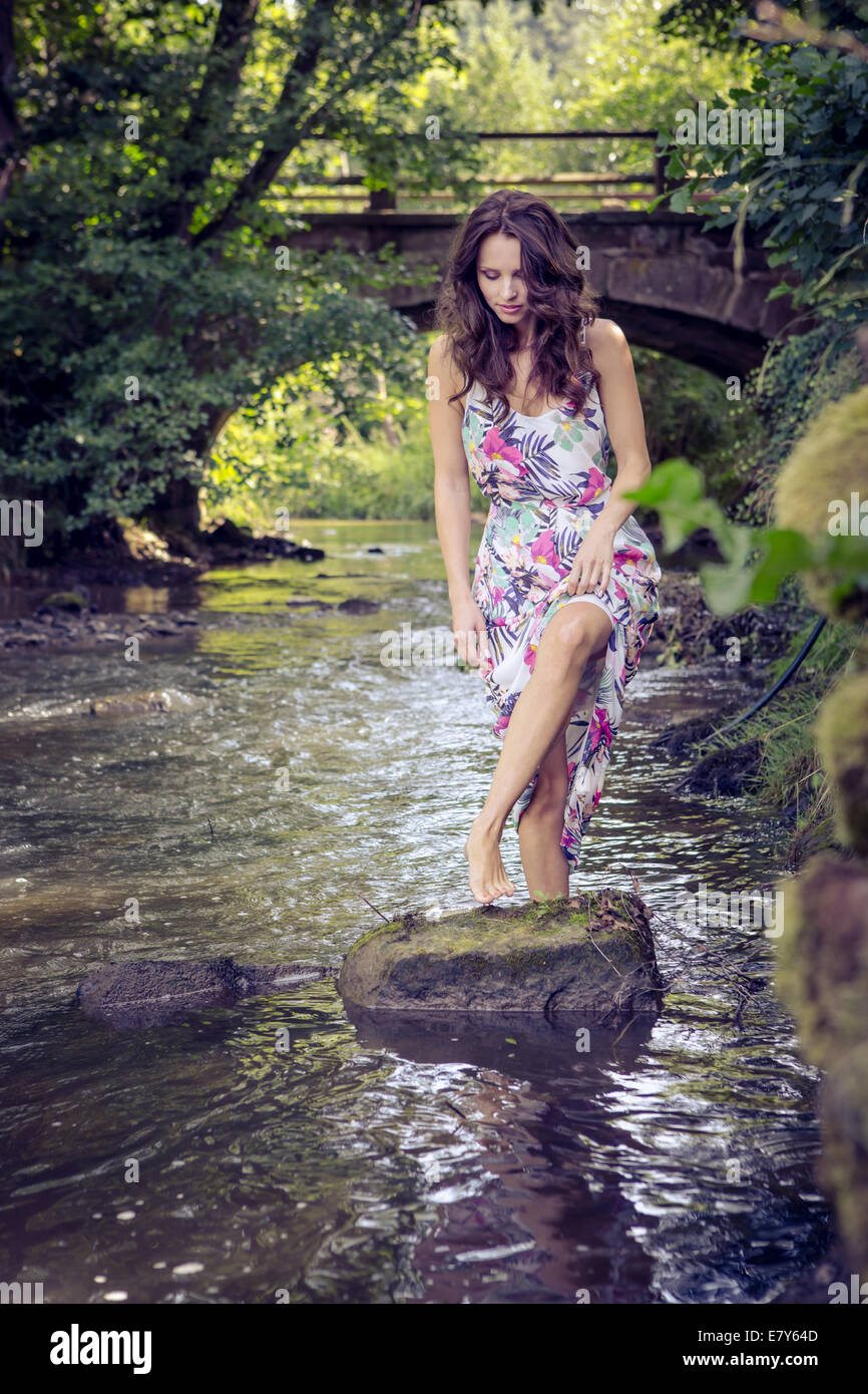 portrait of a young woman in a river Stock Photo - Alamy