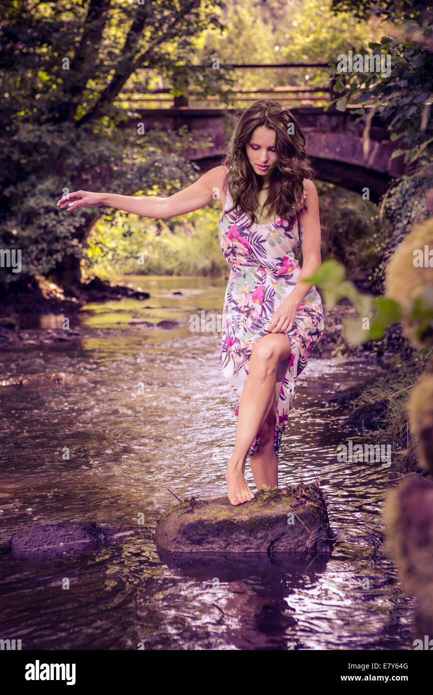 portrait of a young woman in a river Stock Photo - Alamy