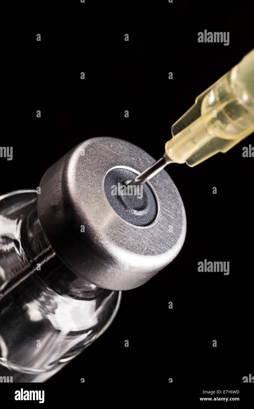 needle and injection in bottle on the glass Stock Photo - Alamy