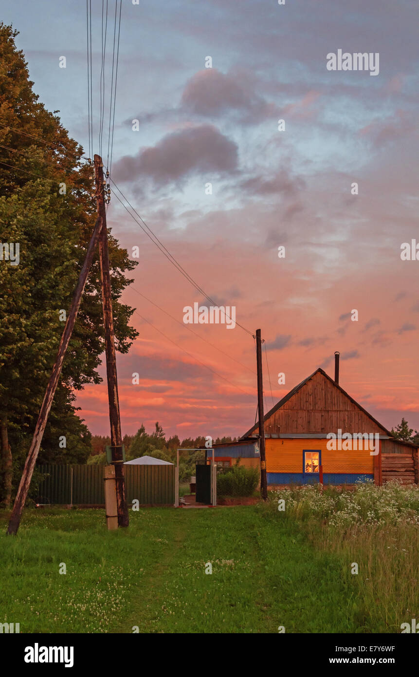 Sunrise over a village Stock Photo - Alamy